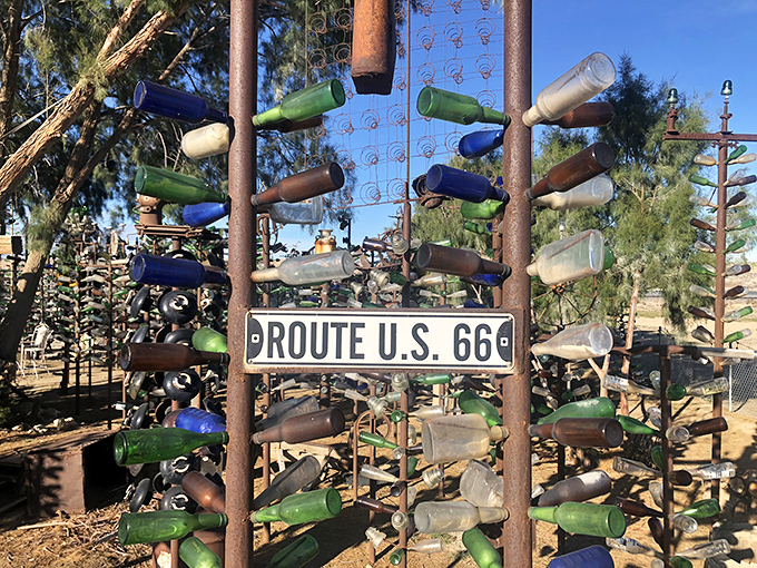 The Mother Road herself gets a place of honor, with Route 66 signage nestled among a rainbow of glass bottles.