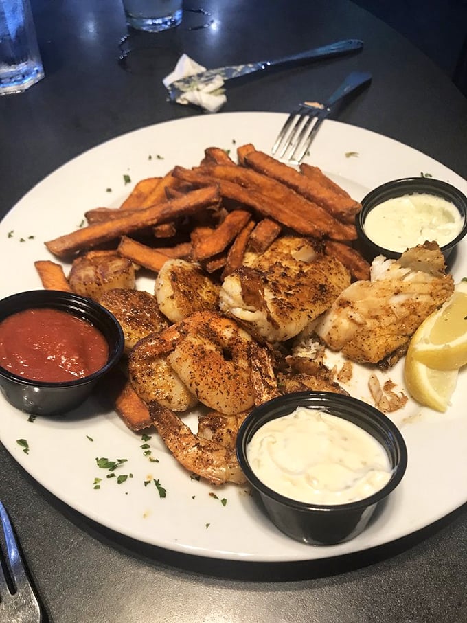 This seafood platter doesn't just feed you—it throws a party for your taste buds. Perfectly seasoned shrimp and scallops with three dipping sauces for customized flavor adventures.
