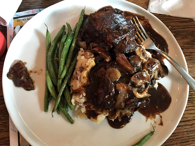 This short rib doesn't just fall off the bone – it practically jumps onto your fork and introduces itself with a saucy handshake.