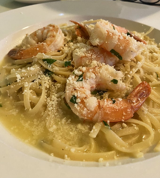 Shrimp scampi so perfectly executed, each tender crustacean practically glows with garlic-infused Mediterranean sunshine and happiness.