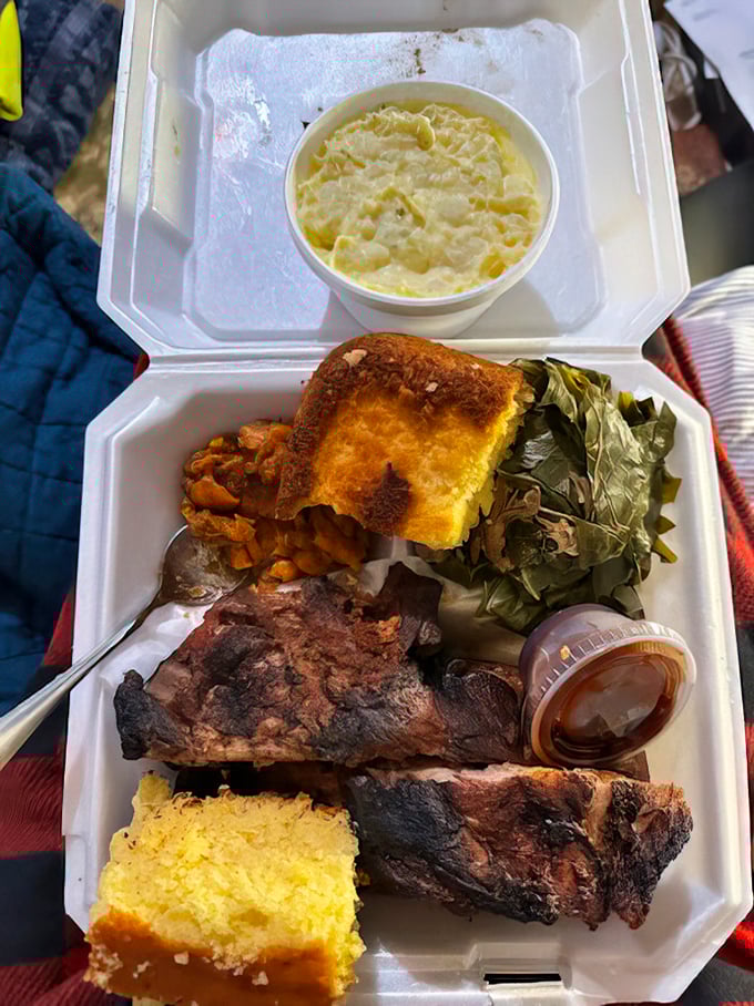A sould food feast fit for royalty: smoky ribs, creamy mac and cheese, collard greens, and cornbread that makes you forget counting calories.
