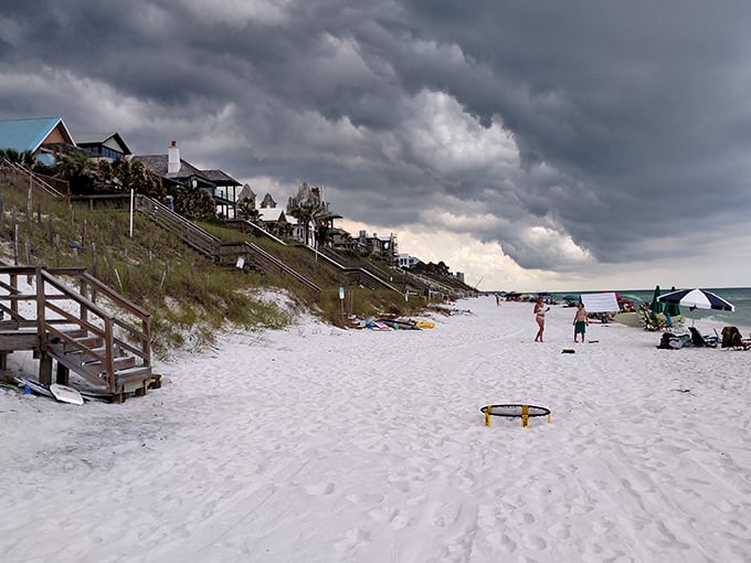 Storm clouds gathering but beach-goers unfazed—they know Florida's weather tantrums are brief and the reward is cooler temperatures afterward.