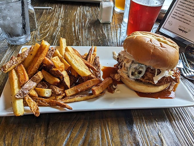 A burger that doesn't need a passport to travel between comfort food and gourmet – topped with what appears to be caramelized onions and melty cheese.