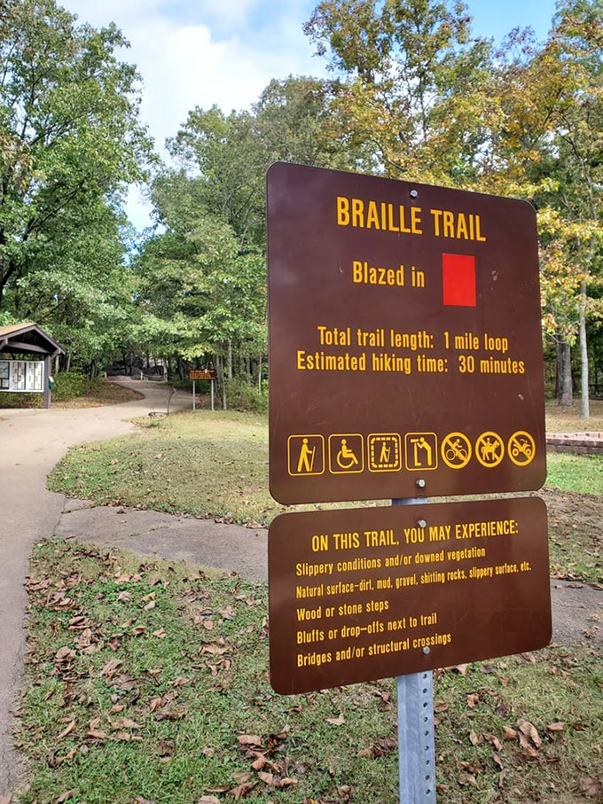 The Braille Trail sign promises a one-mile adventure in just 30 minutes, though time seems to stretch when you're surrounded by billion-year-old companions.