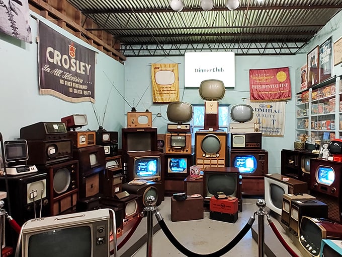 The TV room that proves television used to be furniture first, entertainment second. Crosley, Admiral, and Zenith—the trifecta of mid-century viewing.
