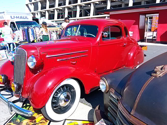 This cherry-red classic car gleams like a Hollywood star, stealing scenes from every passing shopper. 