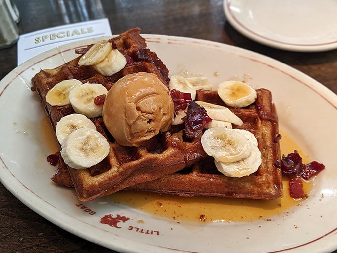 Waffles adorned with bananas, peanut butter, and bacon—Elvis would approve of this harmonious blend of sweet and savory notes.