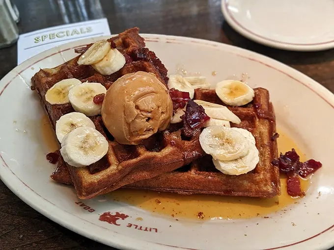 Waffles adorned with bananas, peanut butter, and bacon—Elvis would approve of this harmonious blend of sweet and savory notes.