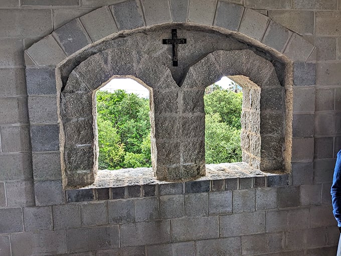 Stone-framed windows offer glimpses of lush Florida greenery, bridging centuries with each glance outside.