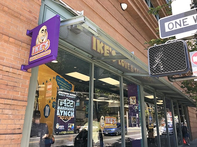 Look for the cheerful purple sign—it marks the spot where Ike's sandwich revolution began its delicious spread.