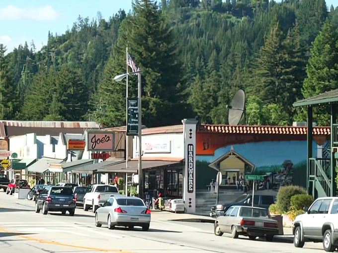 Boulder Creek's main street, where redwoods tower overhead and time seems to move at the pace of a Sunday afternoon.