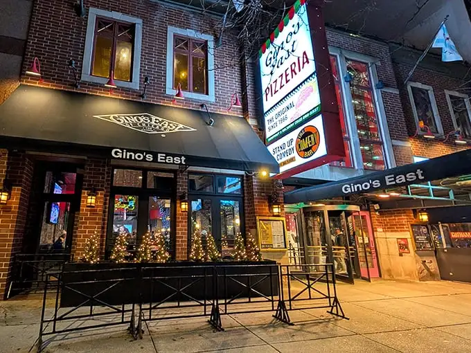 Gino's East glows with invitation after dark, a beacon for deep-dish pilgrims in downtown Chicago.