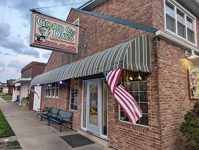 That American flag isn't just decoration – it's a reminder that great fried chicken is as American as apple pie, only crunchier.