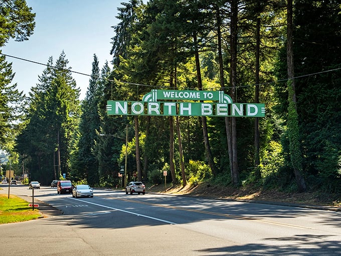 "Welcome to North Bend" spans the road like a friendly handshake, inviting you to this coastal bargain.