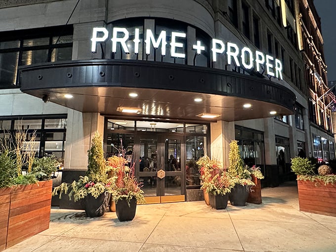 Prime + Proper's sleek exterior and glowing sign promise a modern take on the classic steakhouse experience in downtown Detroit.