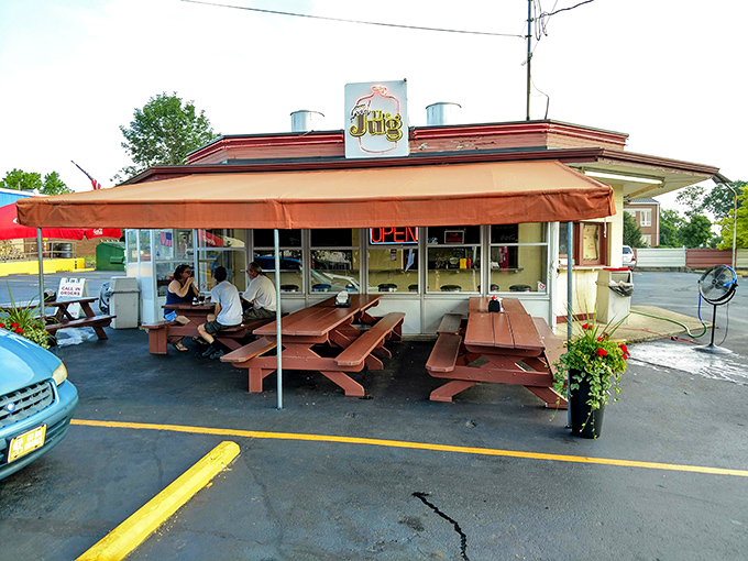 The Jug's outdoor seating isn't just practical—it's where summer memories are made, one burger at a time.