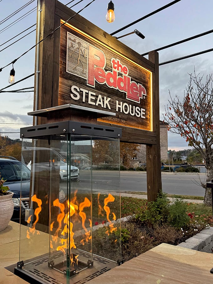 The Peddler's outdoor fire feature is like a beacon for meat lovers—a modern-day signal fire that says "gather here for primal satisfaction."