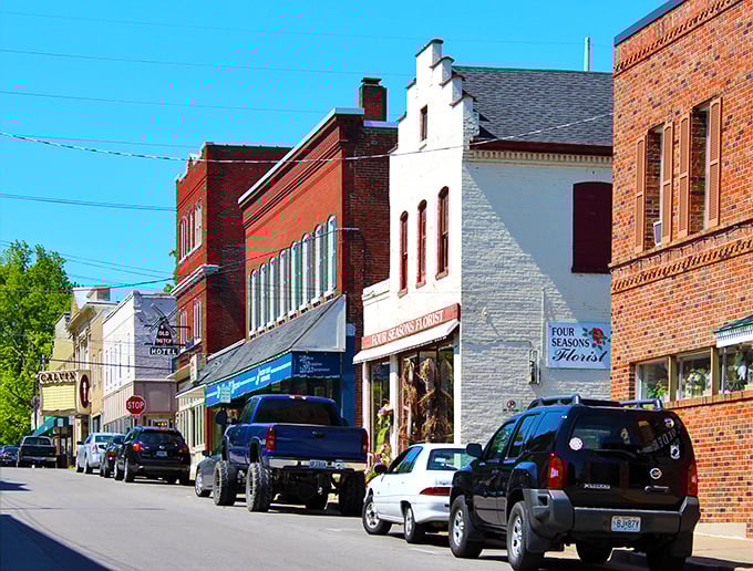 Colorful storefronts create a rainbow of retail therapy opportunities. The brick buildings house treasures waiting to be discovered.