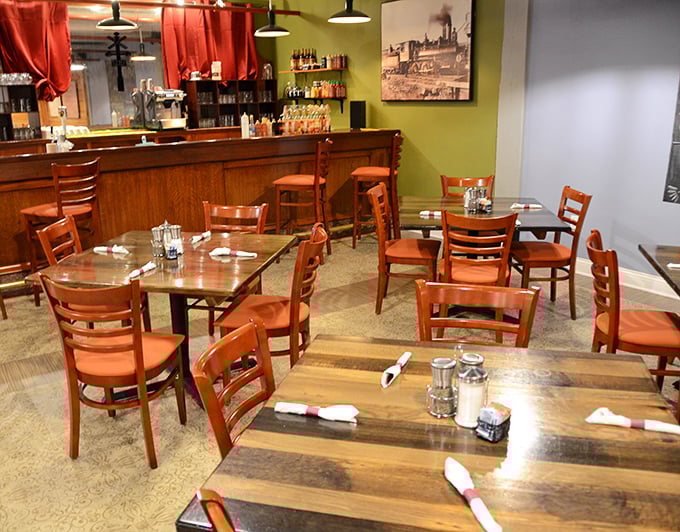 The warm, wood-accented interior feels like breakfast at a friend's farmhouse—if your friend happened to be a brilliant short-order cook.