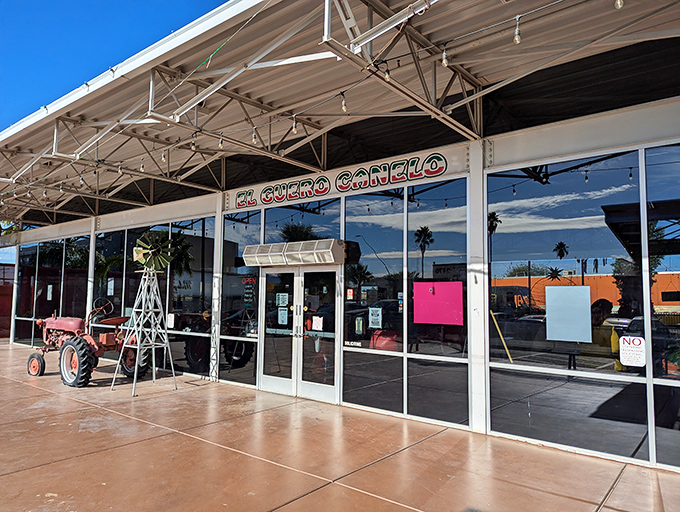 The red tractor stands sentinel outside El Güero Canelo, a quirky welcome to this temple of Tucson's burrito artistry.
