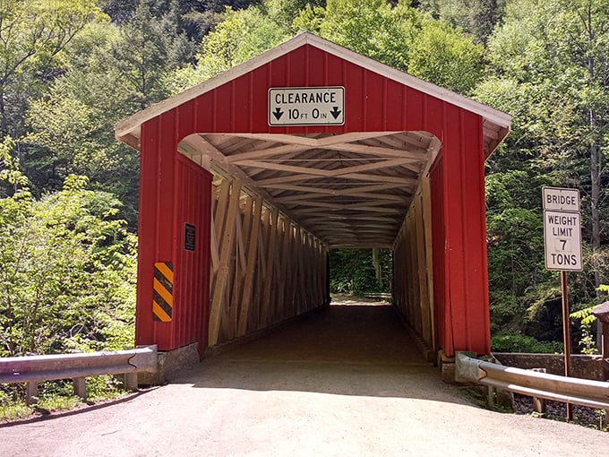 The 10-foot clearance sign isn't just a warning—it's an invitation to duck inside and discover this wooden masterpiece.