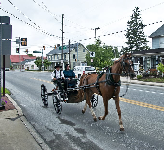 Small-town intersections where life moves at a deliberate pace and the horse-drawn carriage isn't a tourist attraction—it's Tuesday's commute.