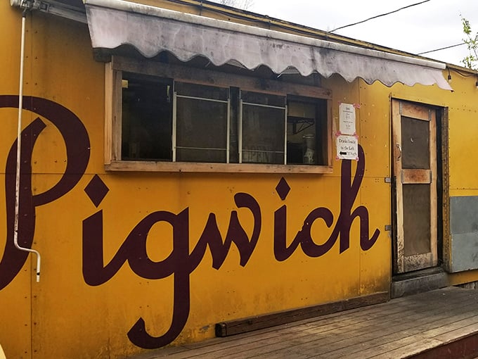 This cheerful yellow building isn't compensating for anything – Pigwich's vibrant exterior perfectly matches the bold flavors waiting inside.