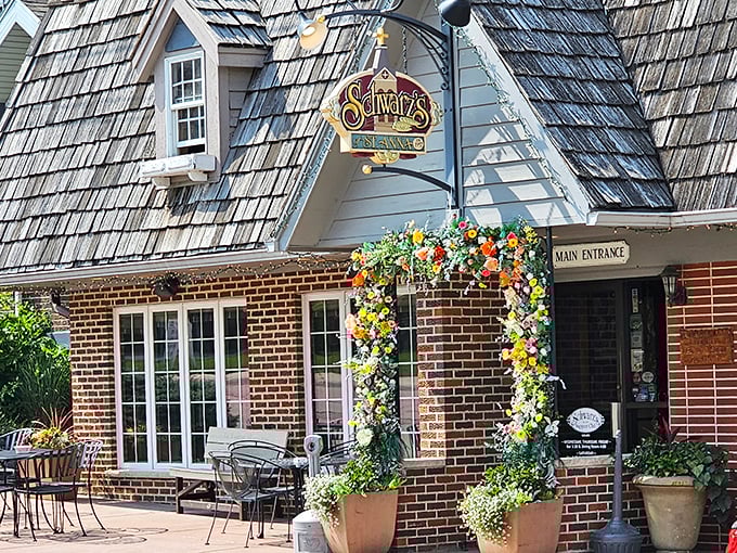 Brick, flowers, and a legendary sign. Schwarz's exterior hints at the culinary magic waiting inside.