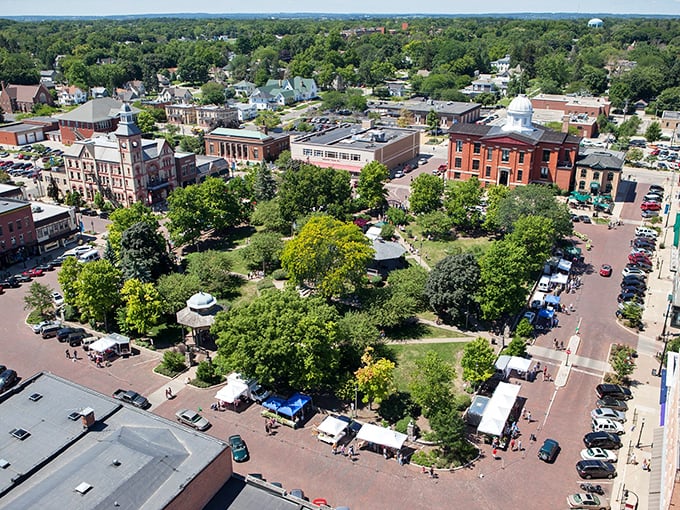 This aerial view of Woodstock reveals the perfect town square – like someone dropped a New England village into Illinois farmland.