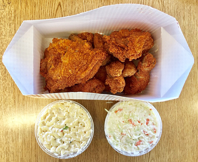 The ultimate family feast: golden fried chicken with creamy mac and cheese and coleslaw. This isn't just dinner—it's an event worth celebrating.