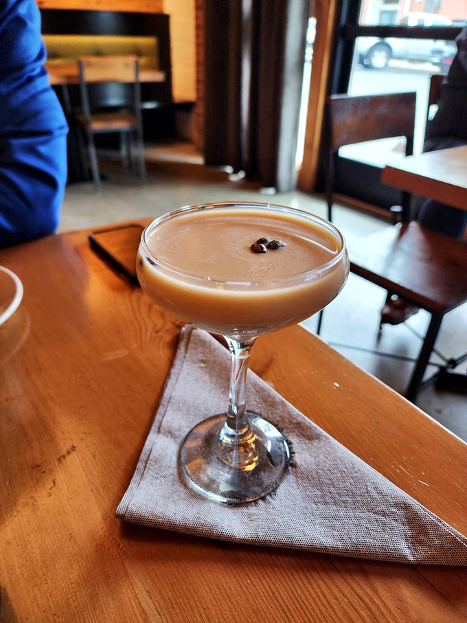 A cocktail that doesn't know if it's dessert or libation—this creamy, coffee-kissed concoction in a vintage coupe glass is what grown-up dreams are made of.