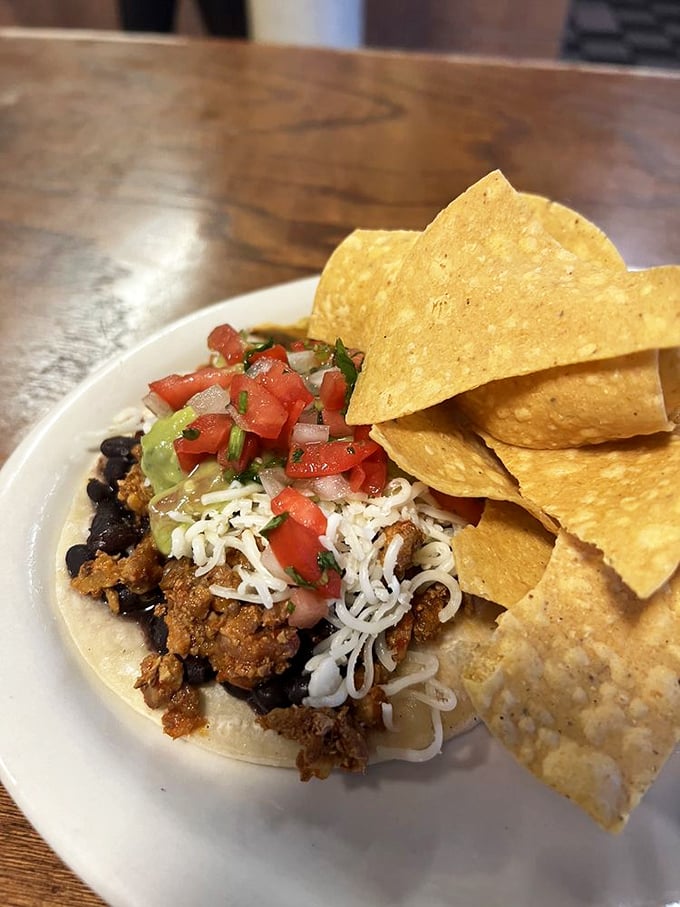 Not just a taco—a flavor fiesta. Every bite delivers a perfect ratio of meat, onion, cilantro, and salsa. Mathematics never tasted so good.