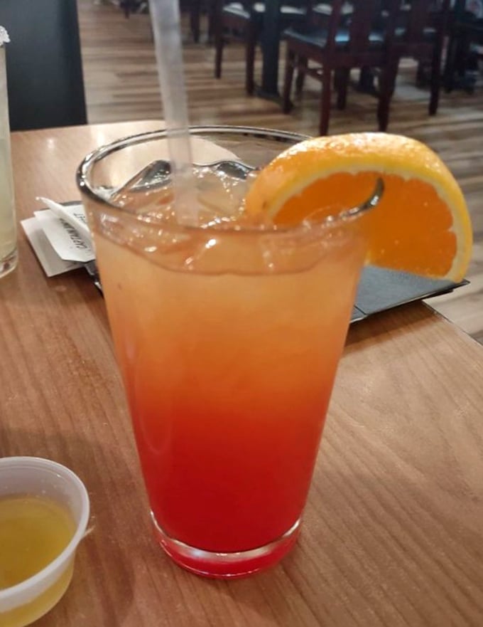 This sunset-in-a-glass cocktail perfectly complements seafood feasting—like having a beach vacation in liquid form.