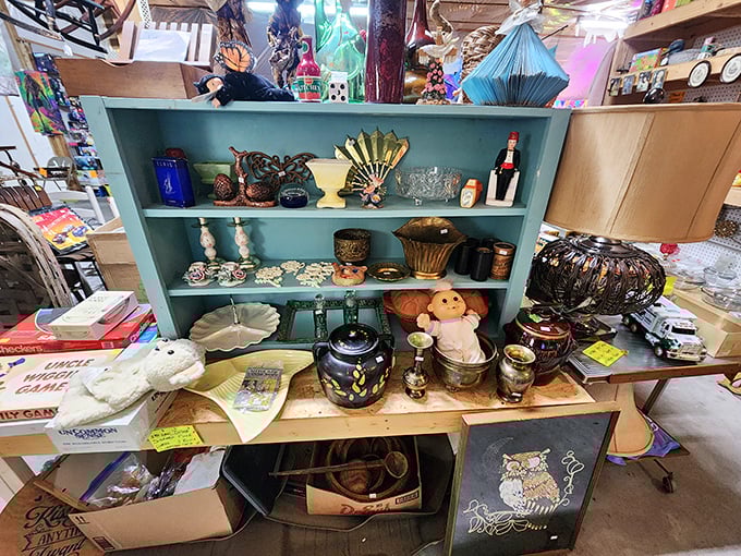 Vintage treasures arranged with loving care—that blue shelf holds someone's memories waiting to become part of your home's story.