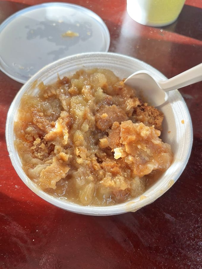 The banana pudding arrives like a sweet, creamy punctuation mark at the end of your barbecue sentence – utterly necessary and completely satisfying.
