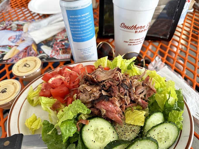 When you need to pretend you're eating healthy – smoked meat atop fresh greens, the culinary equivalent of wearing sneakers with a tuxedo.