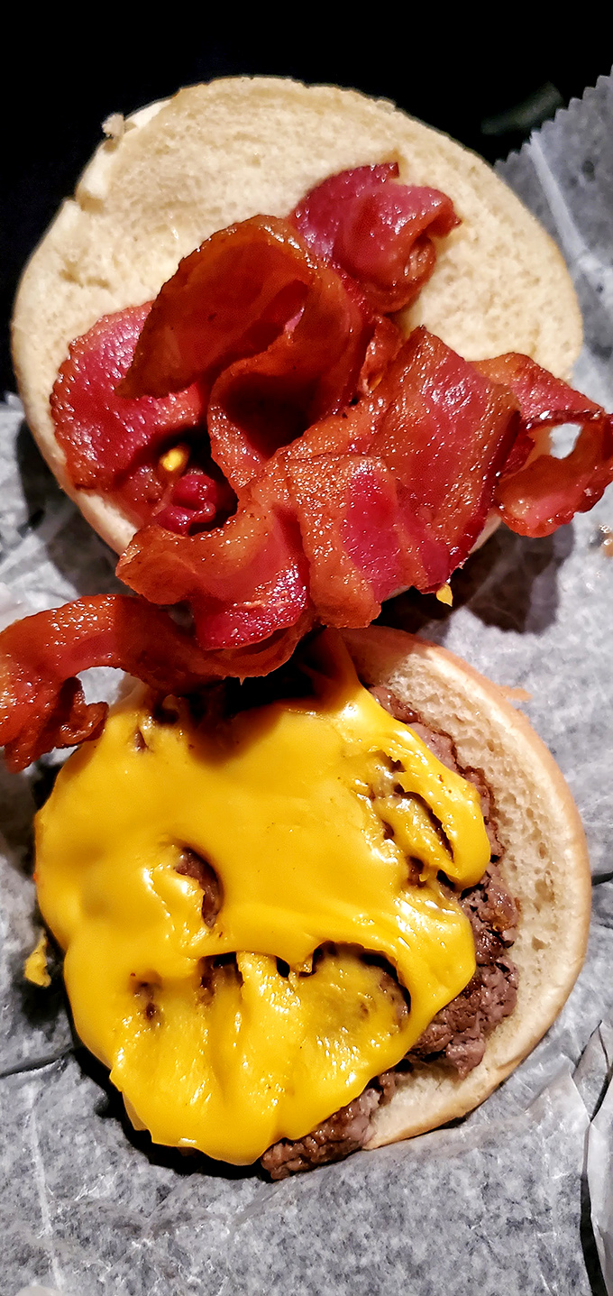 This isn't just a cheeseburger – it's a masterclass in American classics, with melty cheese and bacon that would make any cardiologist nervously fidget.