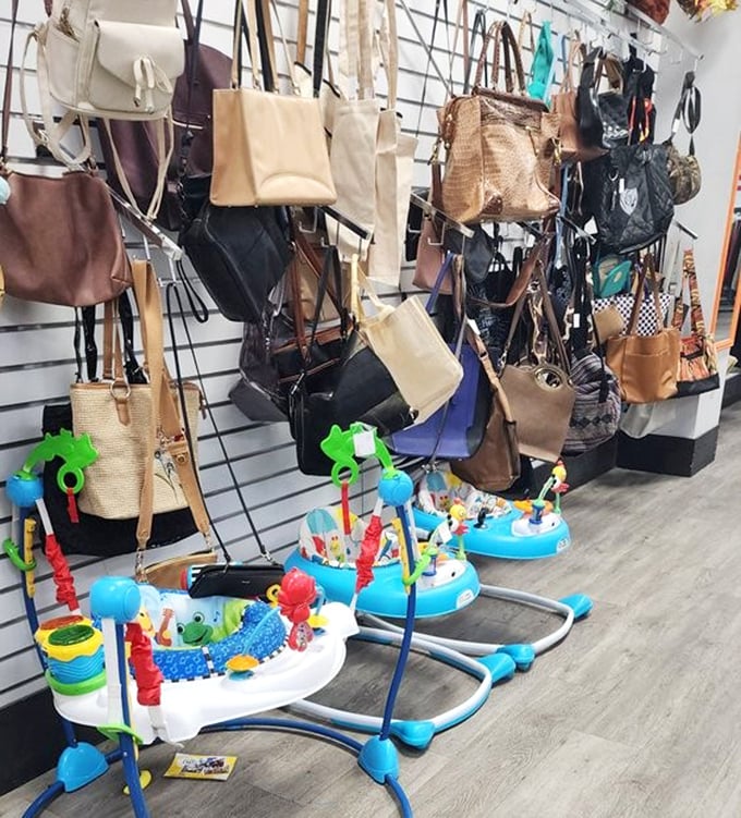 Handbag heaven meets baby bouncer bonanza. One corner of Sunshine Thrift solving multiple life crises simultaneously—from fashion emergencies to fussy infants.