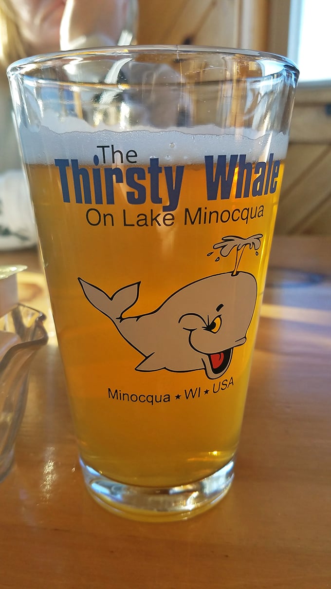 A frosty beer in a glass that tells you exactly where you are – because vacation calories don't count when they're consumed with a view of the water.