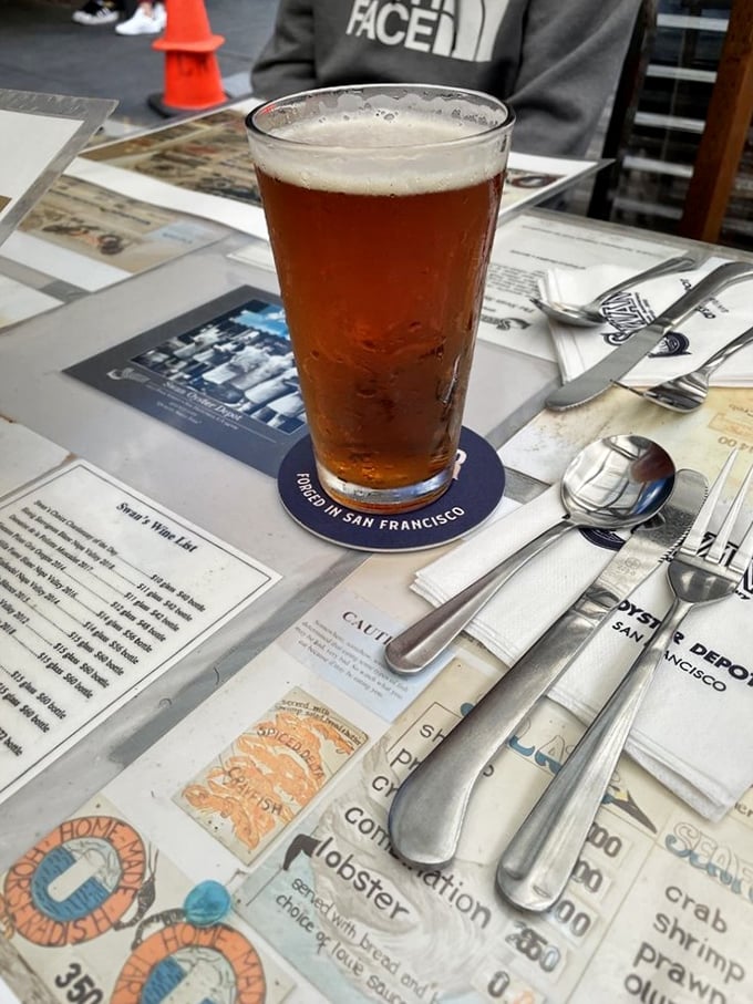 A cold beer on the paper placemat menu – the perfect companion while waiting for seafood treasures. Simple pleasures are often the most satisfying.
