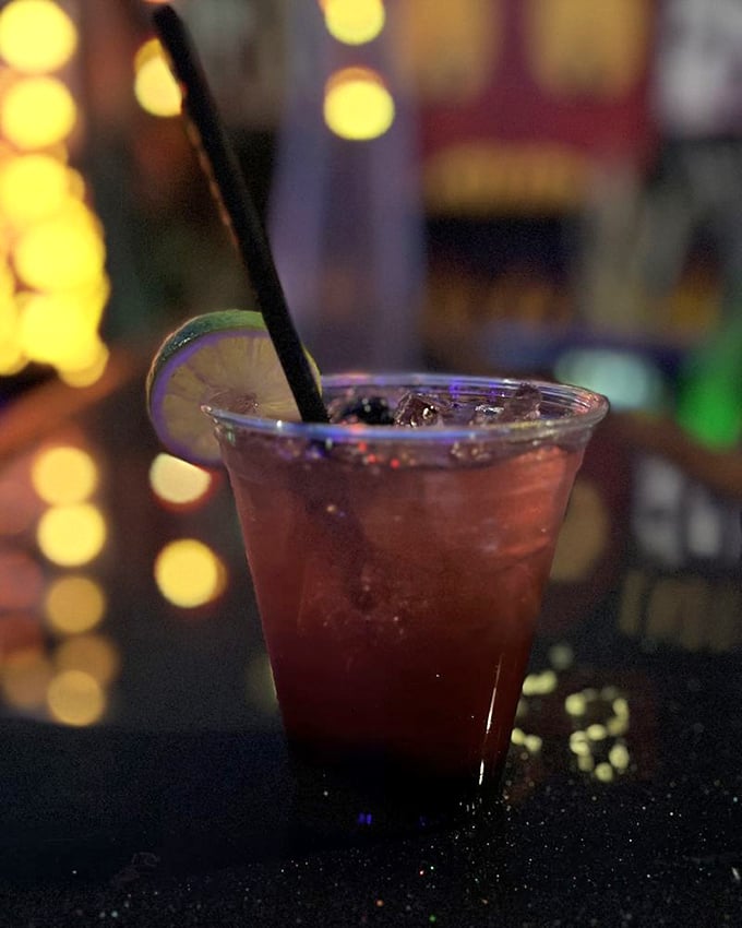 Beetlejuice himself would approve of this cocktail's mysterious allure and theatrical garnish choices. 
