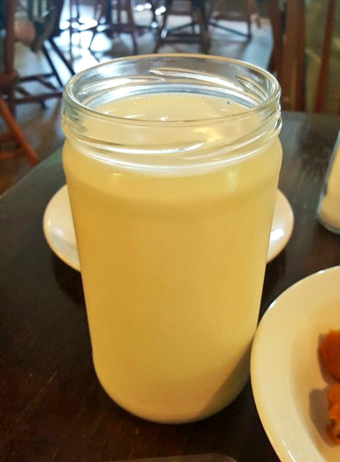Sweet tea served in a mason jar – the unofficial champagne of the South. One sip and you'll understand why Southerners guard their recipes.