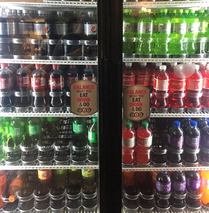 The drink cooler—where sweet tea and sodas await to cool the fire of that vinegar sauce. Barbecue's perfect liquid companions stand at attention.