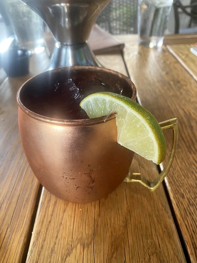 This copper mug isn't just holding a blackberry lemonade mule—it's containing a flavor explosion that's one part summer afternoon, two parts perfect evening.
