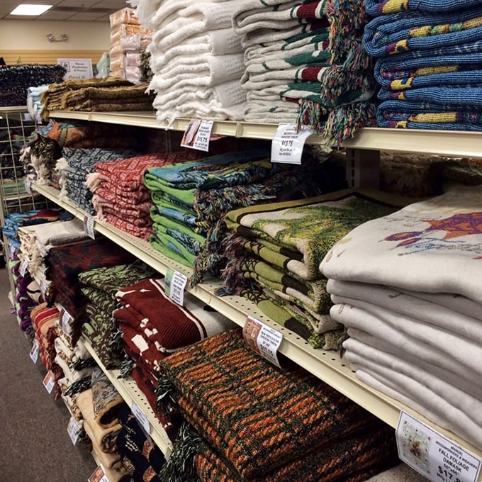 Textile heaven with blankets in every pattern imaginable. Suddenly your couch looks naked and your Netflix sessions woefully under-cozied.