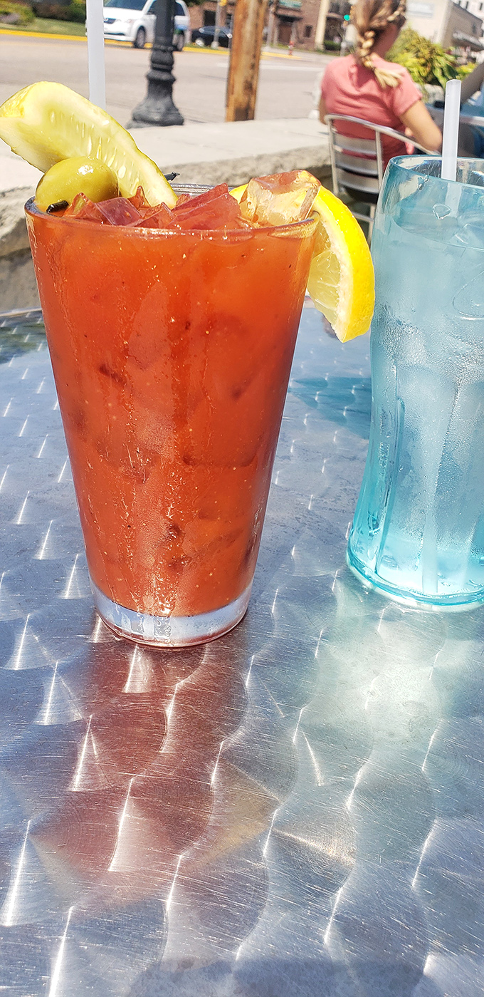 A Bloody Mary that's practically a meal unto itself. That pickle and lemon aren't garnishes—they're exclamation points at the end of a delicious sentence.