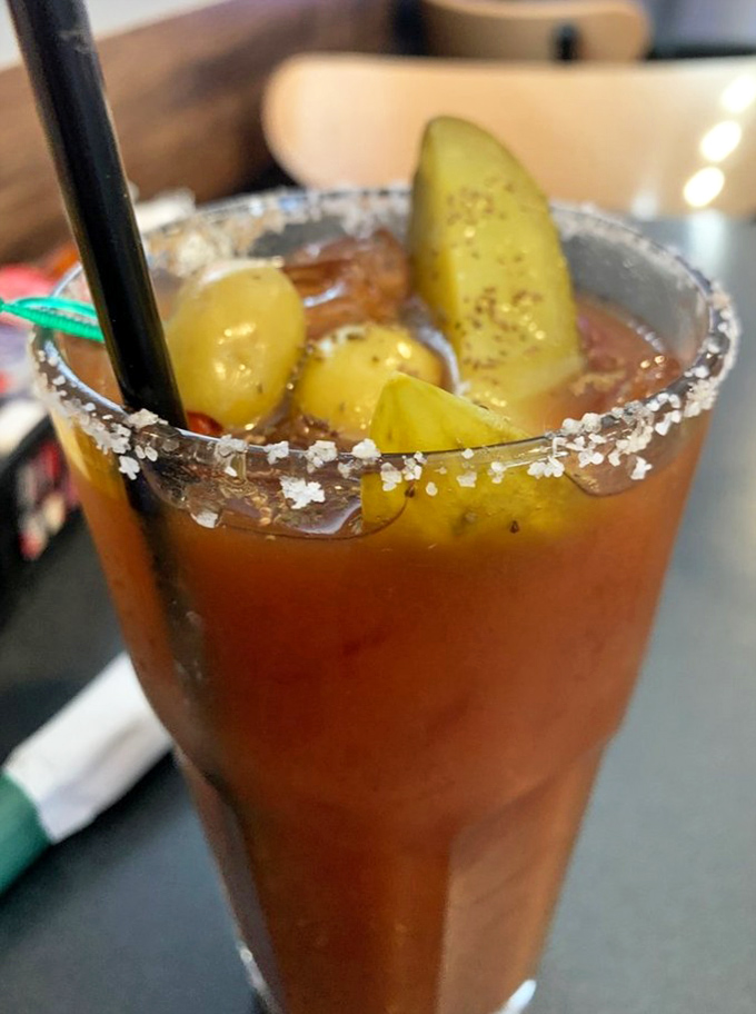 A proper Bloody Mary isn't just a drink—it's a meal with a kick. Those pickle spears standing at attention are the morning's first salute.