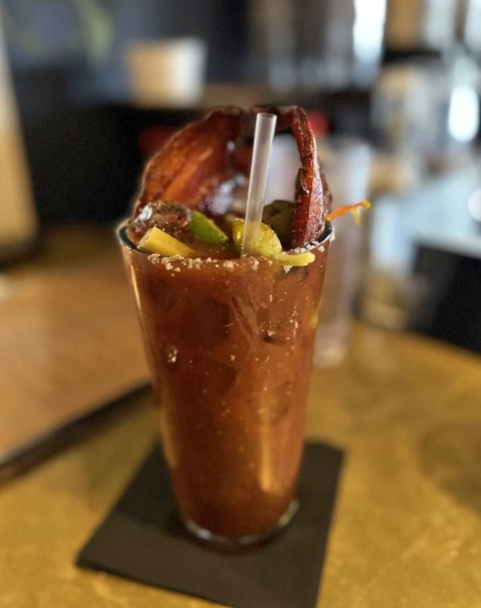 Not just a Bloody Mary—it's breakfast in a glass with a bacon exclamation point. The cocktail equivalent of a standing ovation.