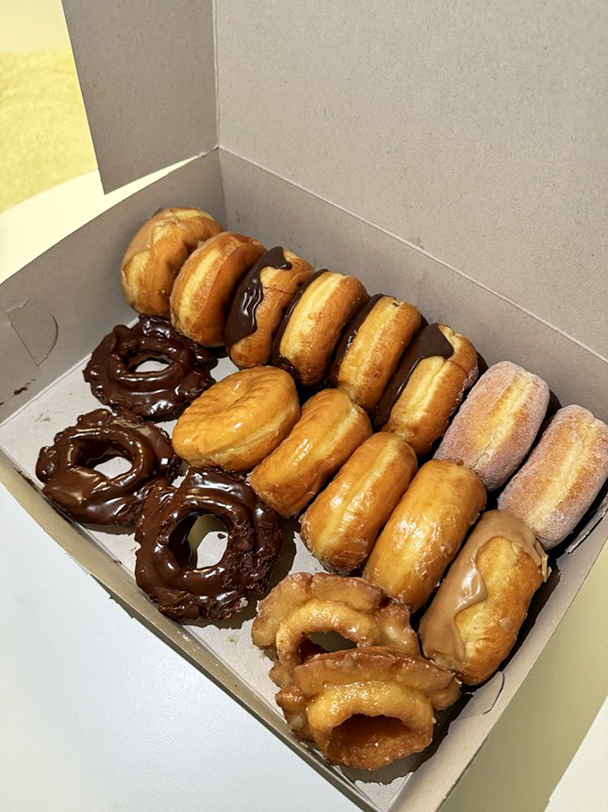 The baker's dozen—a symphony of fried dough arranged in perfect harmony. One bite and you'll understand why sharing is overrated.
