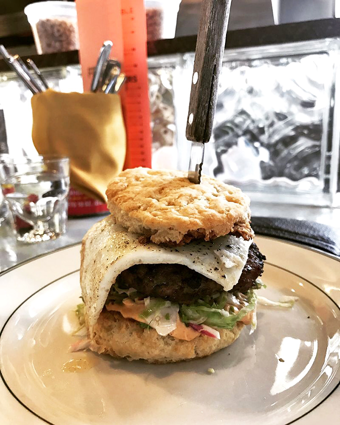 The breakfast biscuit sandwich—where Southern comfort meets Midwestern hospitality. That knife isn't for protection; it's to help you pace yourself.